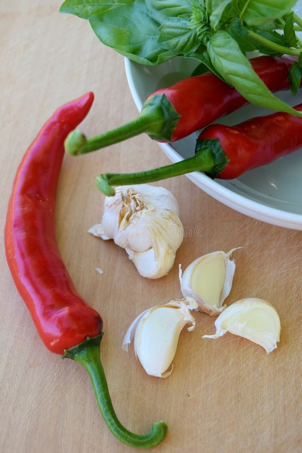Garlic, Basil and Hot Chili Peppers Stock Image - Image of italy, basil ...