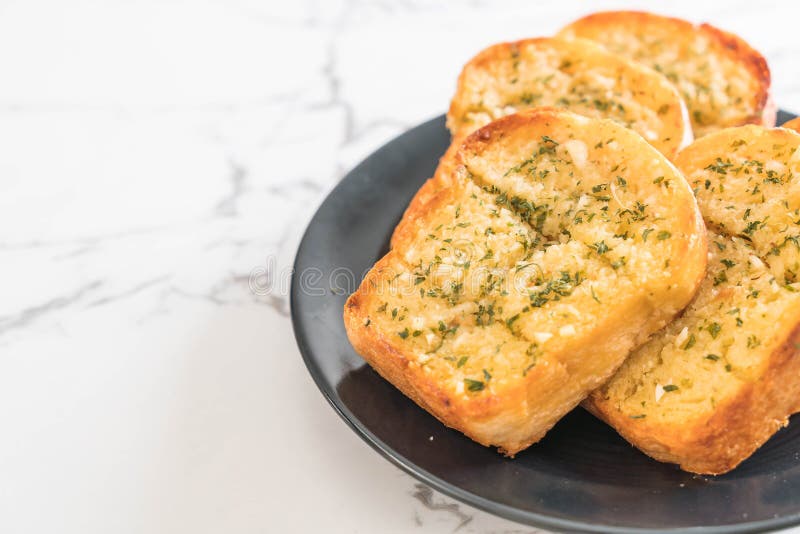 Garlic bread on plate stock image. Image of tasty, crispy - 155633301