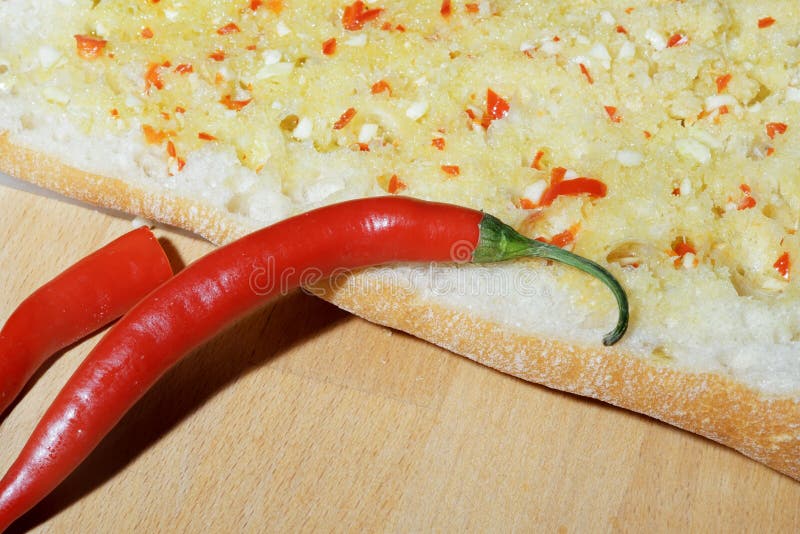 Garlic Bread and Red Chili Peppers Stock Image - Image of capsicum ...