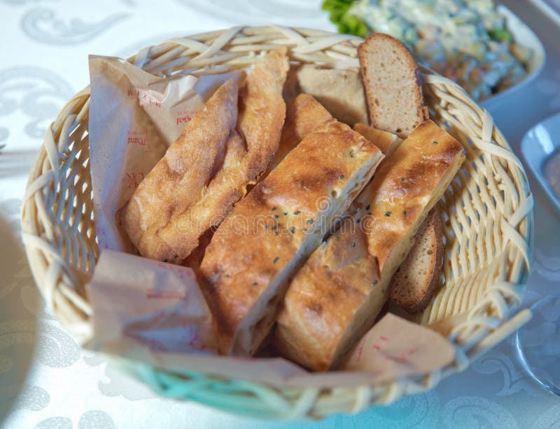 Garlic Breads in the Basket . Pieces of Bread. Cut Bread.Bread in ...