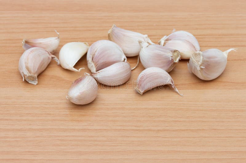 Garlic on Brown Wooden Table Stock Image - Image of healthy, detail ...