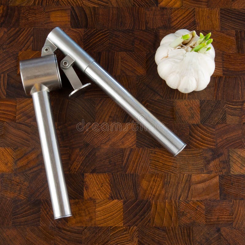 Garlic Bulb and Press on Wooden Surface Stock Image - Image of organic ...