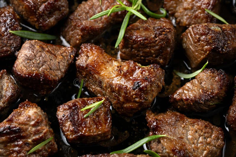 Garlic Butter Beef Steak Bites in Iron Cast Pan Stock Image - Image of ...