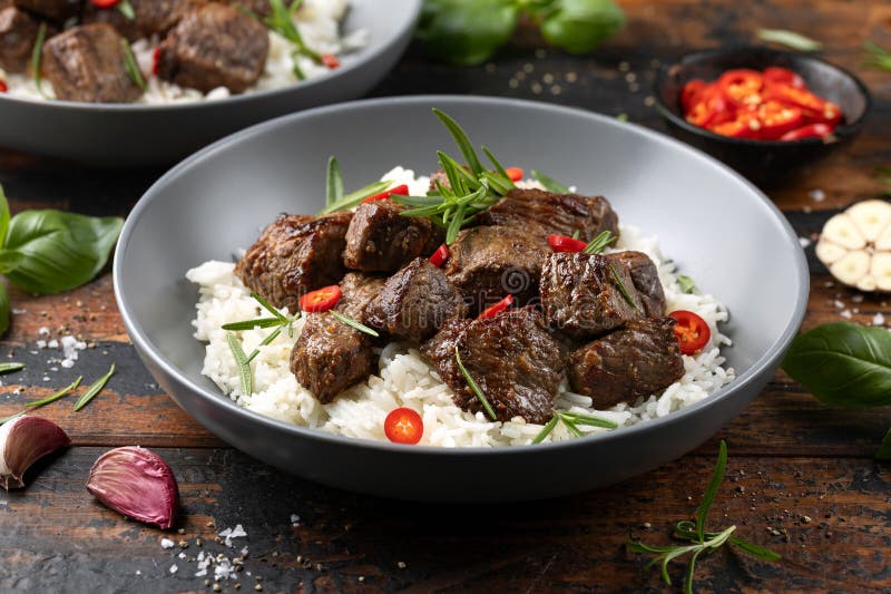 Garlic Butter Beef Steak Bites with Rice Stock Image - Image of meat ...
