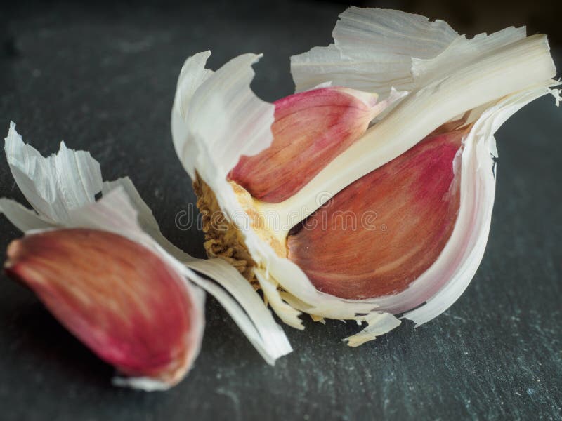Garlic Clove Split on a Slate Base Stock Photo - Image of allium ...