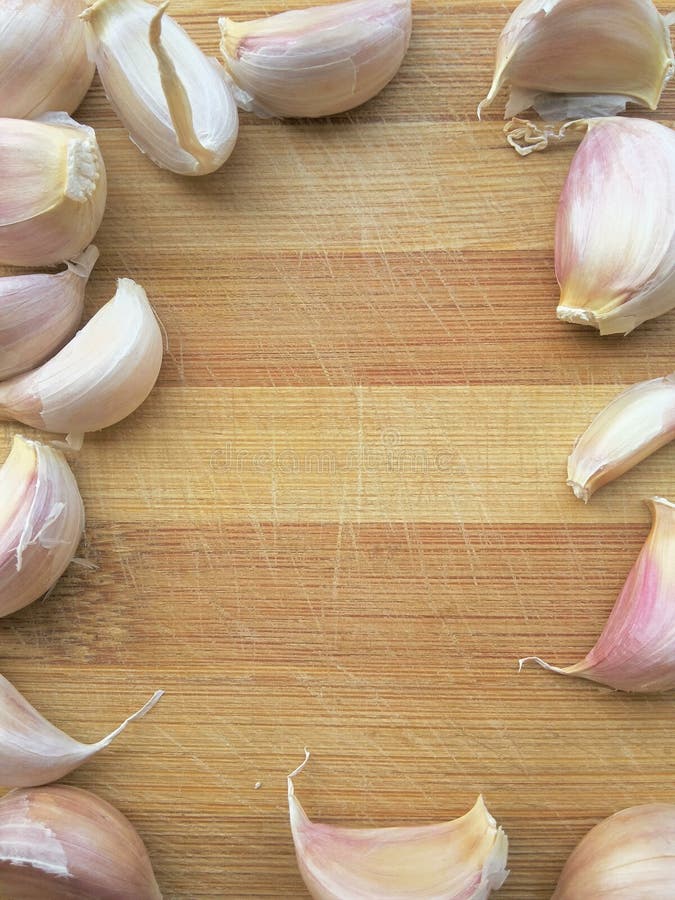 Garlic Cloves Border on Wooden Background Stock Image - Image of fresh ...