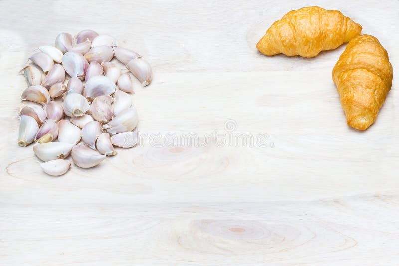 Garlic and croissant stock photo. Image of bakery, spice - 61642656
