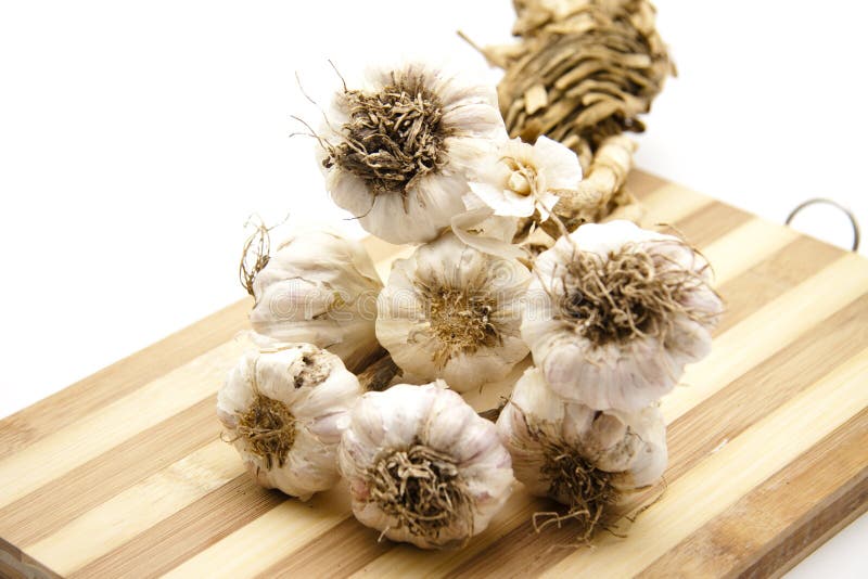 Garlic on edge board stock photo. Image of harvested - 29839910