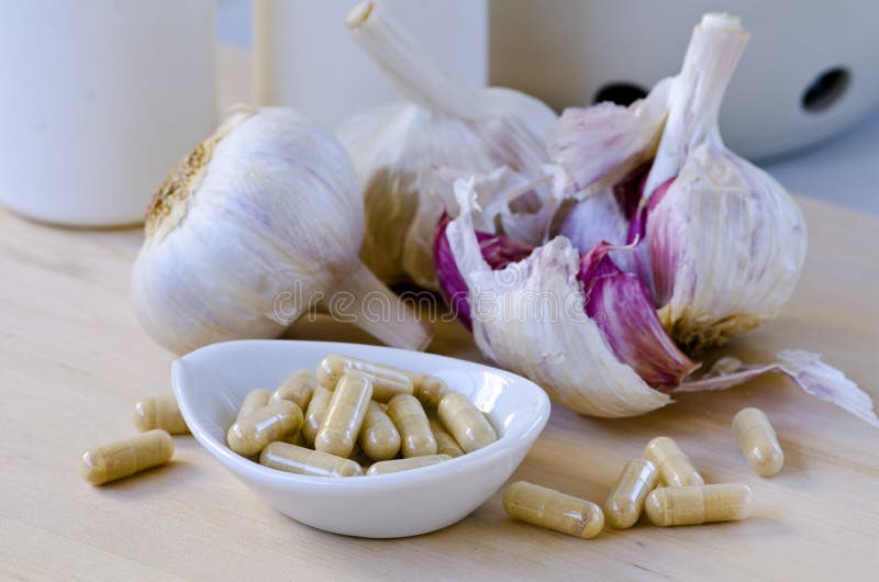 Garlic extract capsules stock photo. Image of color, daylight - 51803156