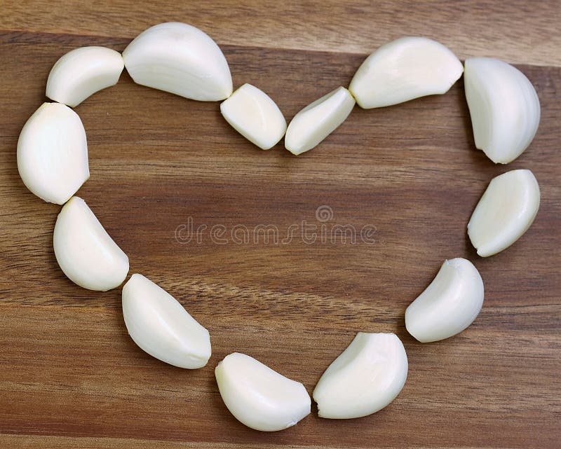 Garlic heart stock photo. Image of bulb, surface, healthcare - 67847164
