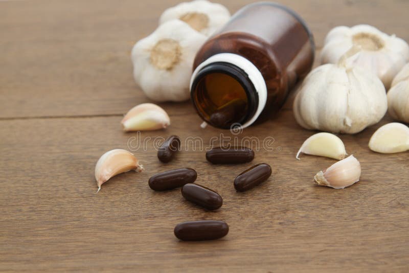 Garlic Herbal Supplement Pills Stock Photo - Image of healing ...