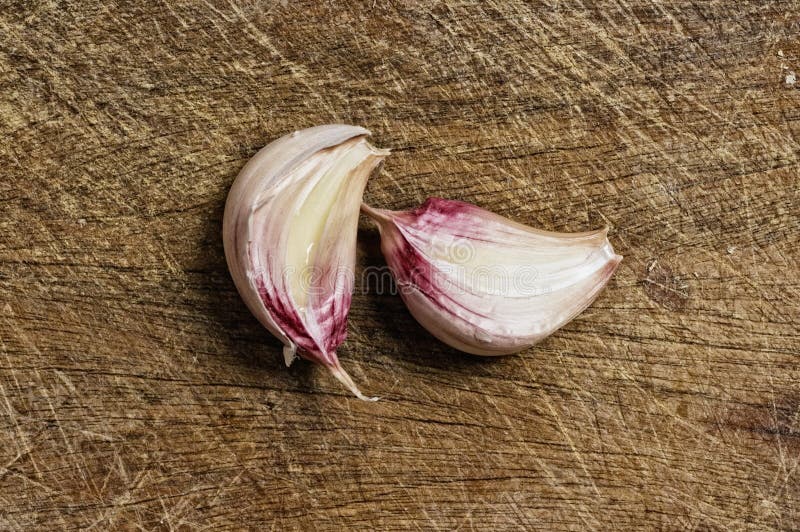 Garlic on kitchen table. stock image. Image of gourmet - 5366067