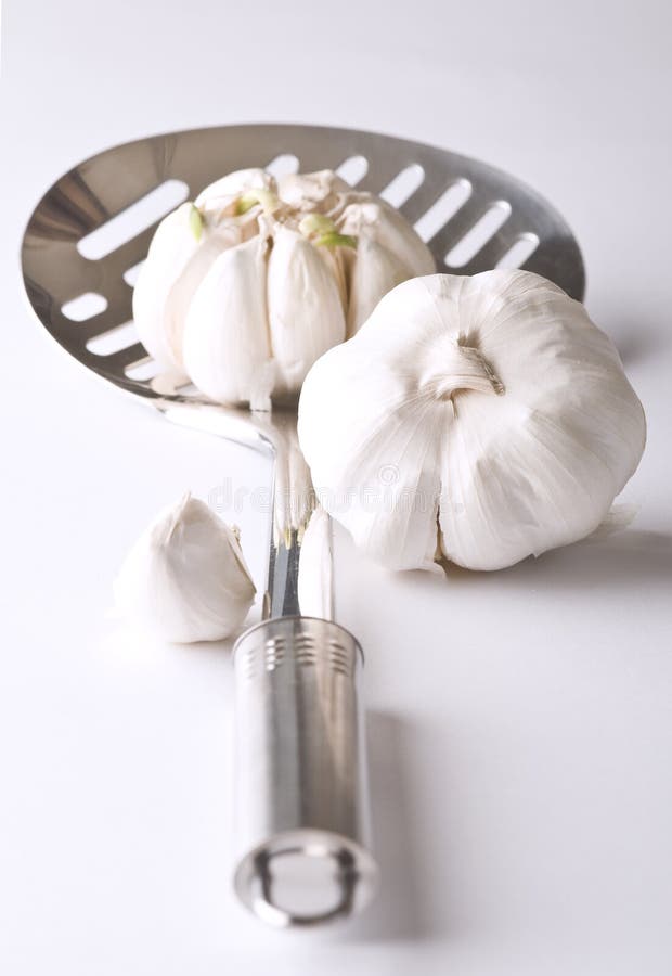 Garlic with the Kitchen Tool Stock Photo - Image of table, ingredient ...