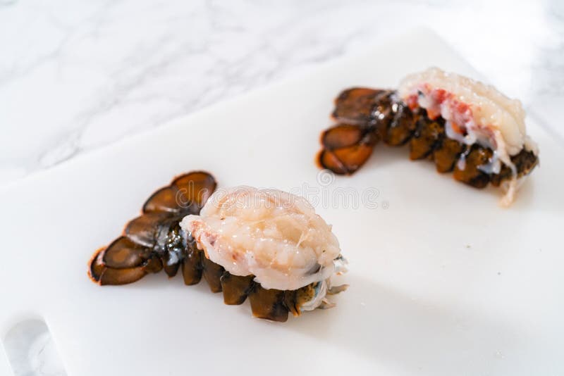 Garlic lobster tails stock photo. Image of lobster, shellfish - 268240124