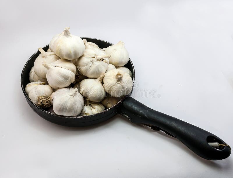 Garlic Mass with Pan on White Background Stock Image - Image of gourmet ...