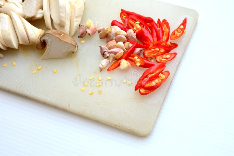 Garlic, Mushroom Chilli on Chopping Block Stock Image - Image of garlic ...