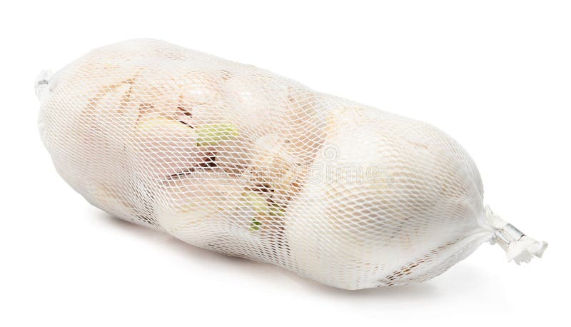 Garlic in Net Packaging on a White Isolated Background. Close-up. Side ...