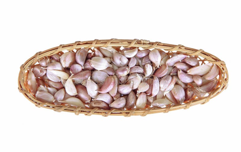Garlic in Oval Basket Weave on White Background Stock Photo - Image of ...
