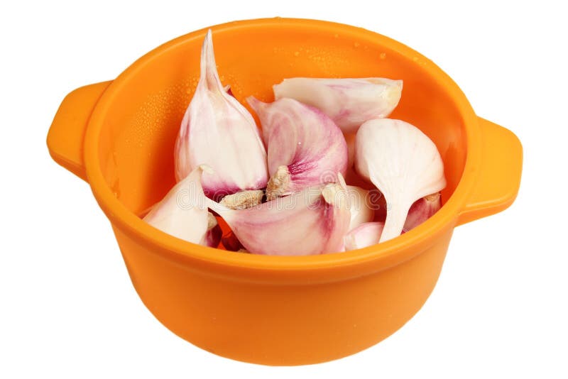 Garlic in a Pan from Silicone Stock Photo - Image of seasoning, orange ...