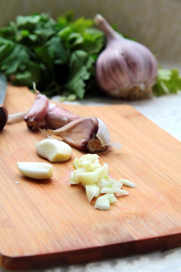 Garlic, peeled and sliced stock image. Image of ingredient - 17143107