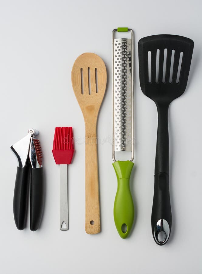 Garlic Press Brush Spoon Spatula Zester on White Background Stock Image ...