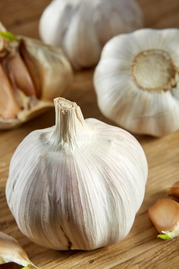 Garlic Close Up on Rustic Wooden Background, Shallow Depth of Field ...