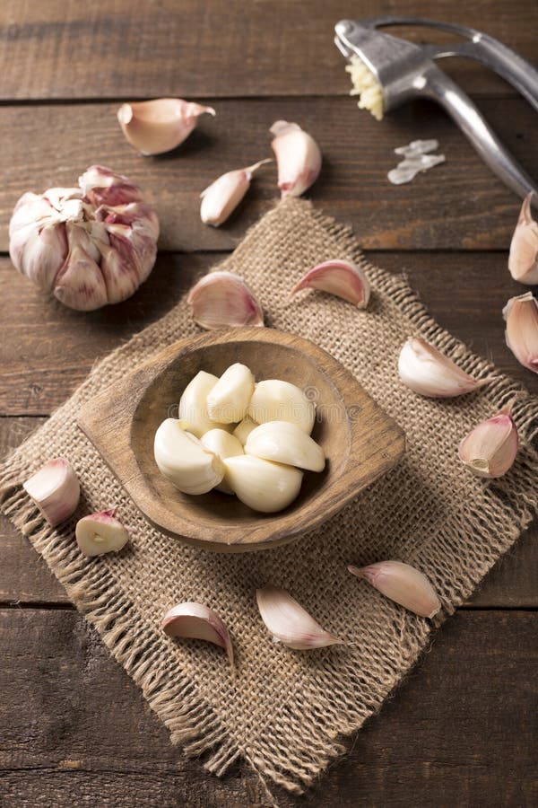 Garlic in rustic style stock photo. Image of garlic, white - 66701656