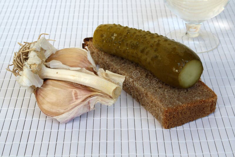 Garlic and Rye Bread on a Table Stock Photo - Image of space, color ...