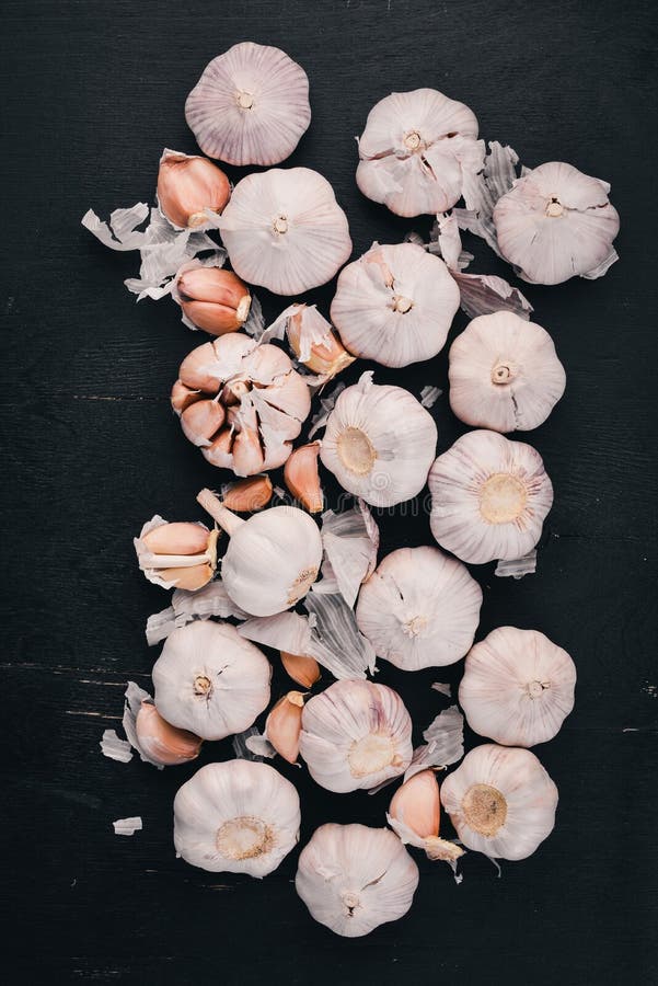 Garlic. a Set of Fresh Garlic on the Chest Wooden Background Stock ...