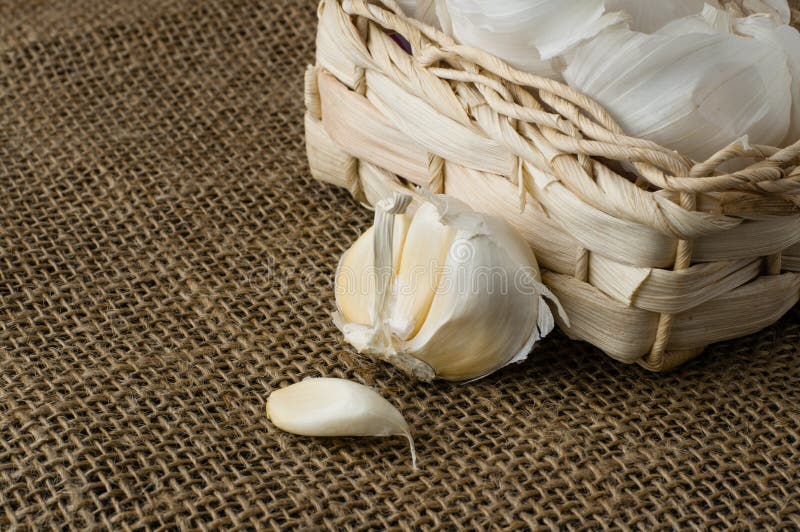 Garlic in a small basket stock image. Image of garlic - 66276315