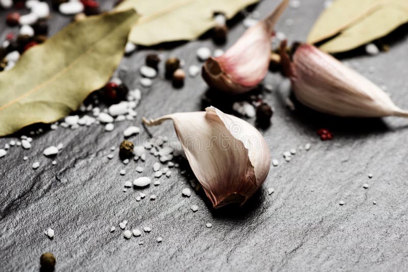 Garlic on stone stock photo. Image of gourmet, cuisine - 197319436
