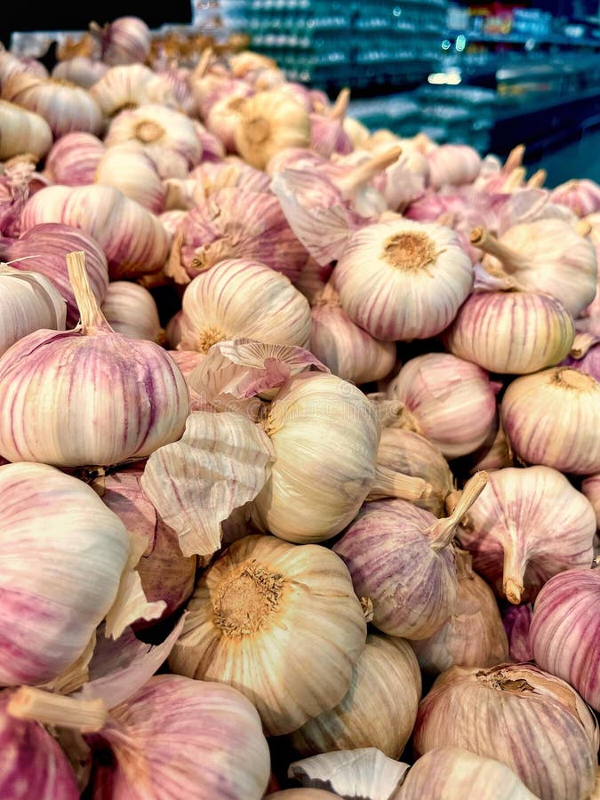 A Bunch of Garlic Heads on a Supermarket Counter Stock Photo - Image of ...