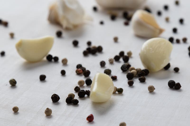 Garlic on Table with Condiments Stock Photo - Image of group, clove ...