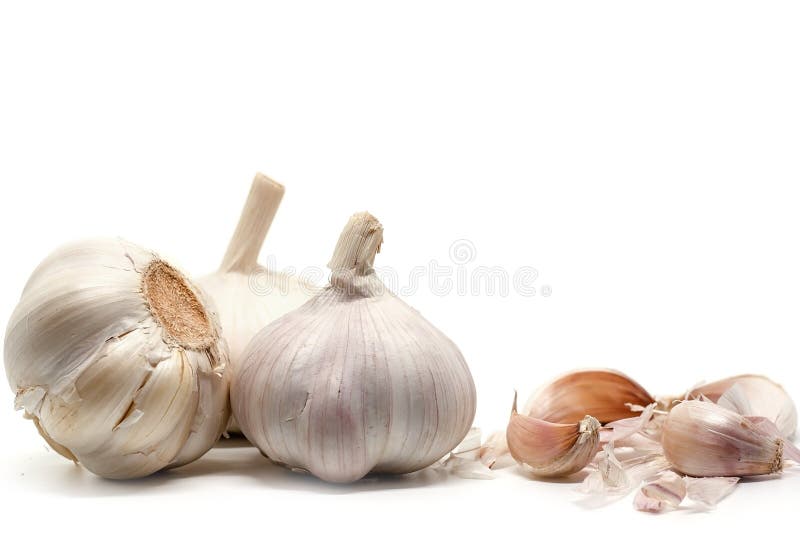 Garlic on white background stock photo. Image of aromatic - 144967586