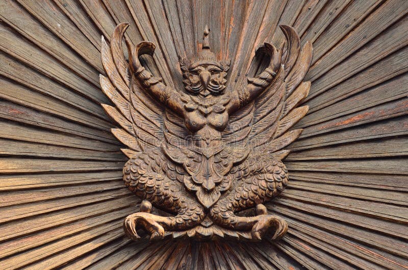 Garuda on the wooden wall stock photo. Image of bird - 43278266