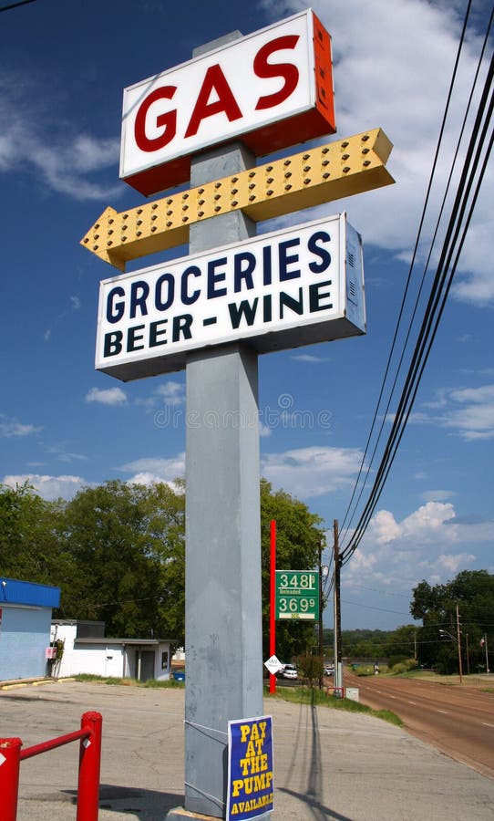 Gas, Beer and Grocery Sign with Blue Sky and Clouds in Background Stock ...