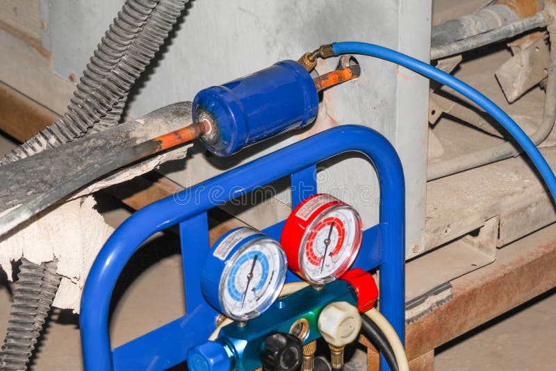 Gas is Being Refiling into the Heavy Ac Compressor of Central Air ...