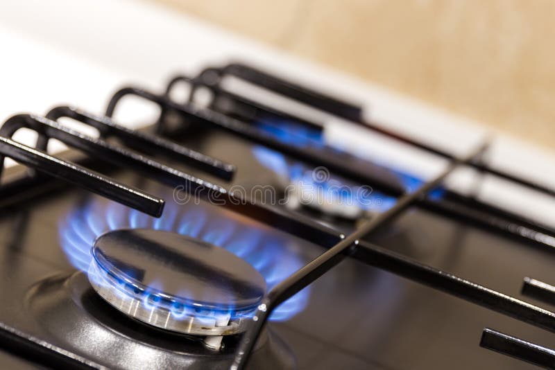 Gas Burner on Black Modern Kitchen Stove Stock Image - Image of home ...