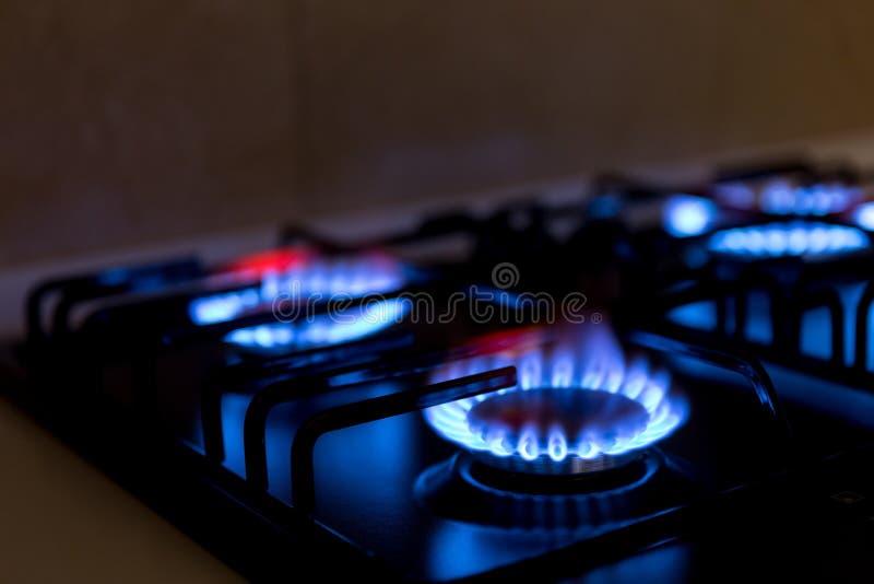 Gas Burner on Black Modern Kitchen Stove Stock Photo - Image of cooking ...