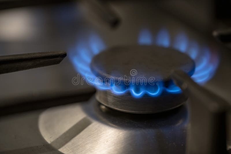 Gas Burner on Kitchen Stove Stock Photo - Image of flame, glowing ...