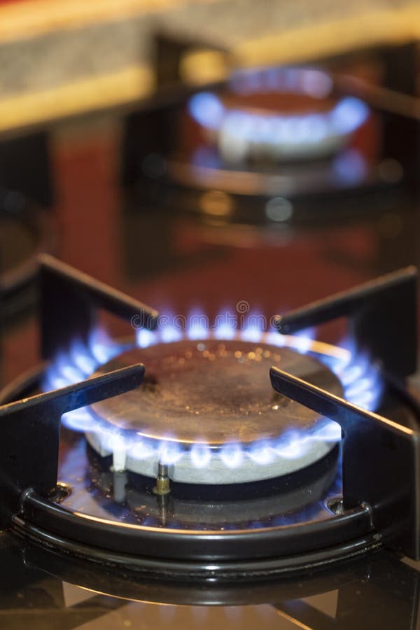 The Gas Burns in the Burner of a Kitchen Stove. Stock Image - Image of ...