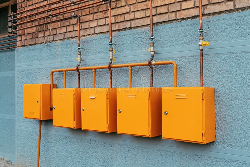 Gas Consumption Meter Yellow Boxes on Building Exterior Wall Stock ...