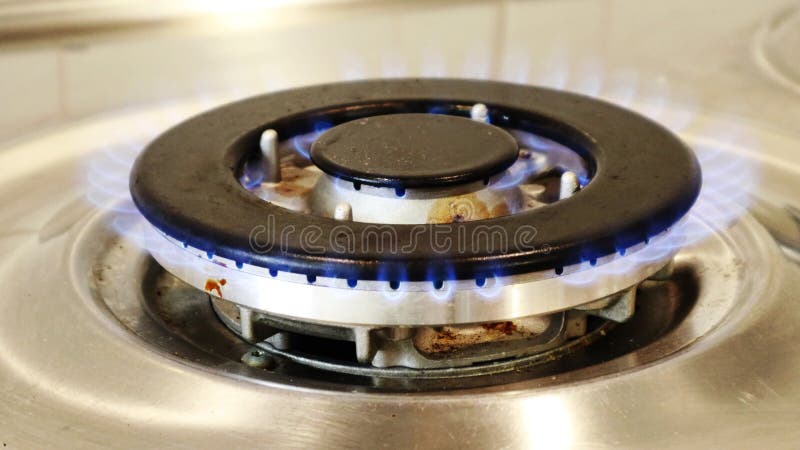 Gas Cooker with Burning Flames of Gas. Domestic Kitchen with Blue ...