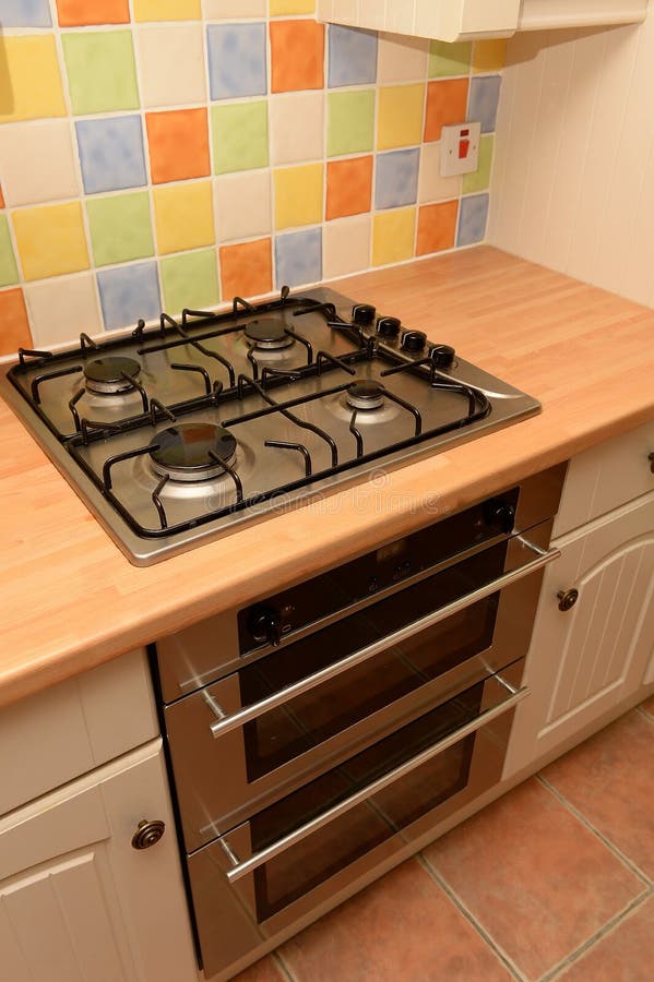 Gas cooker in new kitchen stock photo. Image of blue - 38103510