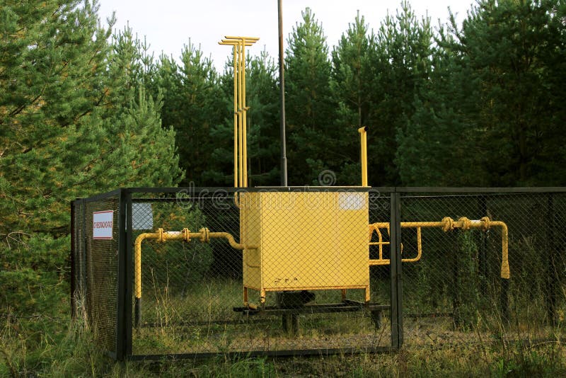 Gas Distribution Point Fenced with a Grid in the Green Forest Stock ...