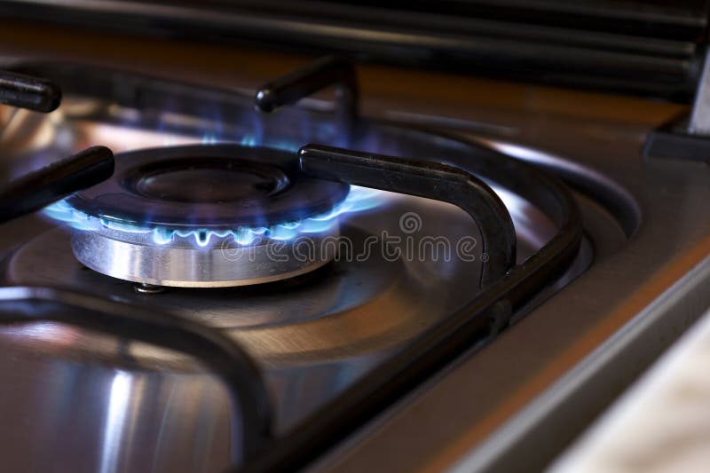 A Gas Flame on a Hob in a Kitchen Stock Photo - Image of cooking ...
