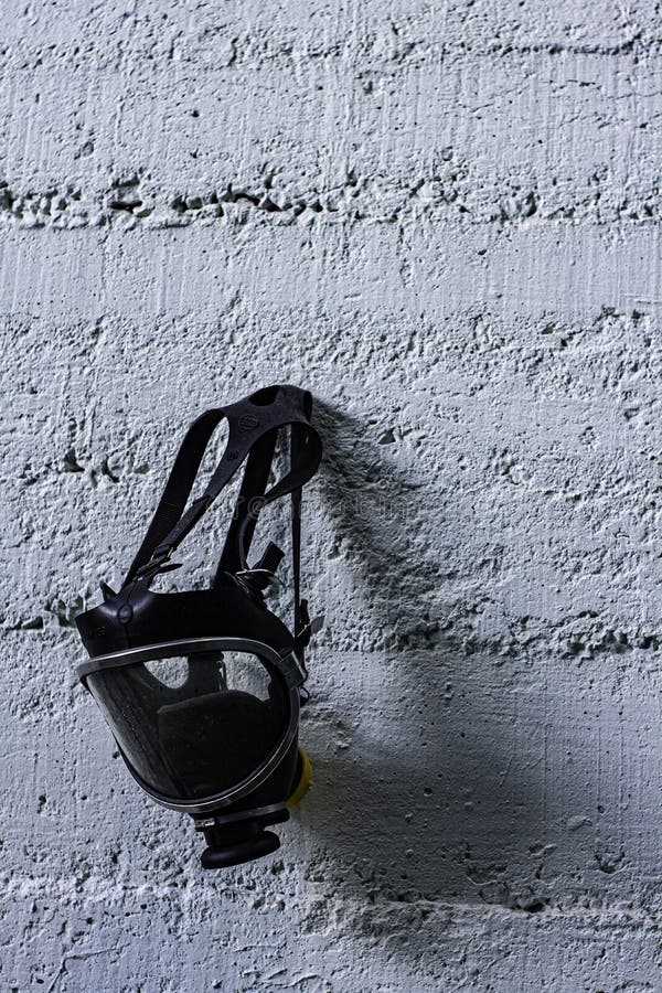 Gas mask on the wall stock photo. Image of glass, blue - 166602850