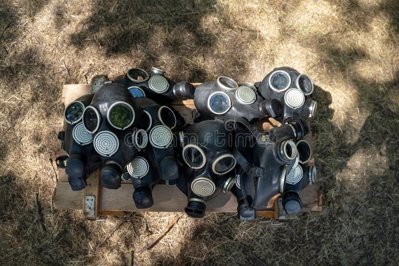 Gas Masks Lie on a Wooden Box Stock Photo - Image of filter, hazard ...