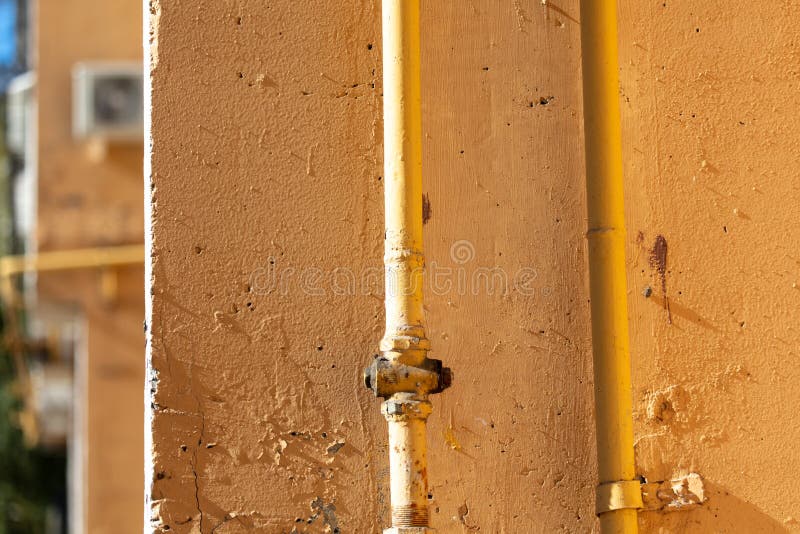 Gas Pipe Hanging on the Wall of a Building Stock Photo - Image of ...