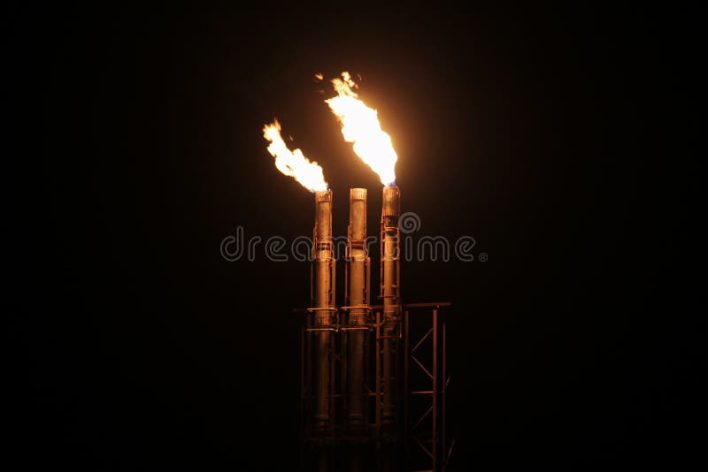 Gas plant flame stack stock image. Image of platform - 101026301